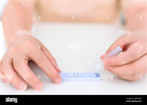Woman Using Coronavirus Covid Rapid Antigen Home Testing Kit Stock Photo Alamy