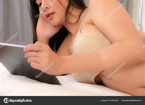 Sexy Woman Using Tablet Her Bedroom Stock Photo Success Media 613915362