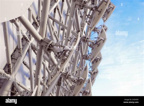 The Detailed Metal Framework Of A Contemporary Architectural Structure Is Prominently Displayed