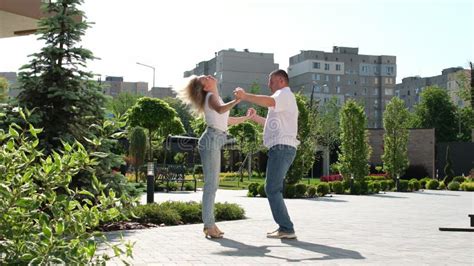 People Dancing Salsa And Bachata In Outdoor Cafe Urban Mixed Race