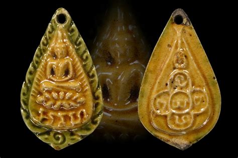 พระกลีบบัวอรหังหลวงปู่ไข่ วัดเชิงเลน เคลือบเหลืองเขียว ปี 2470 หูตากระพริบ พระเมืองเหนือ