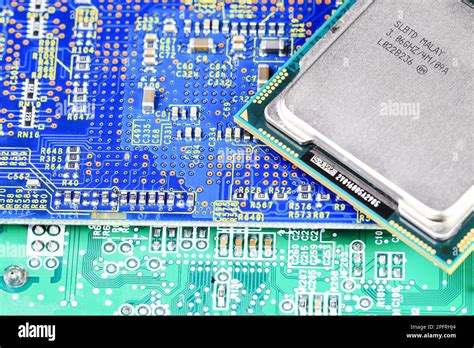Close Up Of High Performance CPU Or Central Processor Unit On Electronic Board Background Stock