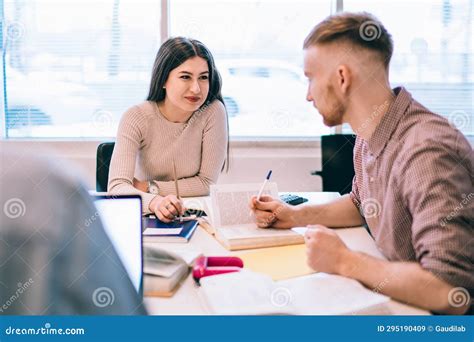 Female Student Explaining Information To Classmate Stock Image Image