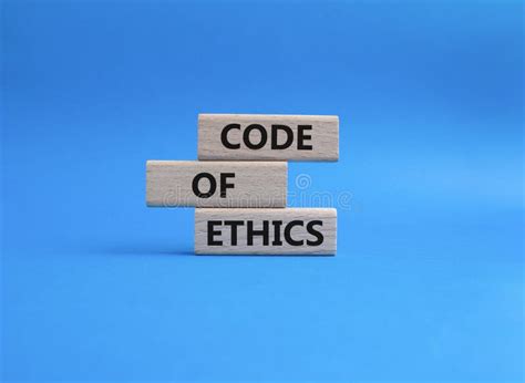 Code Of Ethics Symbol Concept Words Code Of Ethics On Wooden Blocks Beautiful Blue Background