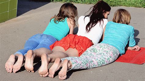 Three Barefoot Girls Adele Catherine And Margarita On Summer Pavement