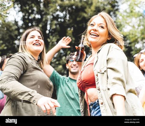 Portrait Of Two Young Curvy Happy Women At A Dancing Party Message Of