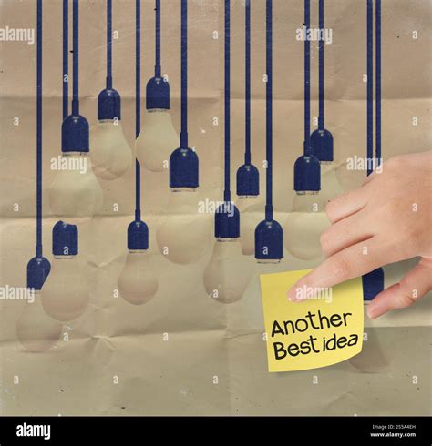 Hand Touch Sticky Note With Another Idea Light Bulb On Crumpled Paper As Creative Concept Stock