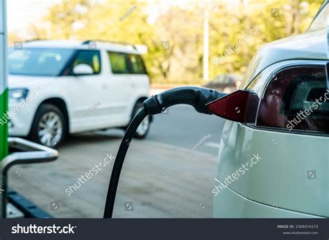 電気自動車の充電ステーション。車両を充電するためのポートのタイプとコネクタ。写真素材2309374173 Shutterstock