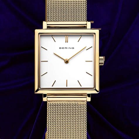 Elegant Schicke Uhr Classic In Goldfarben Mit Weißem Zifferblatt Von Bering Das Schmuckbäumchen