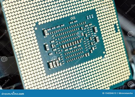 Engineer Plugging Cpu Microprocessor To Motherboard Socket Computer Technology And Hardware