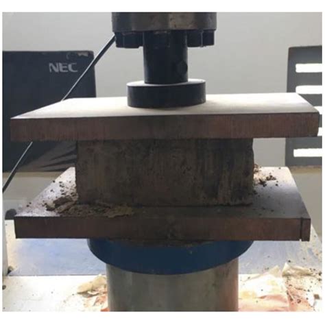 Compressive Test Setup A Block B Mortar Cube And C Masonry Prism Download Scientific