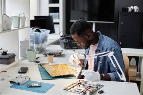 Black Man Repairing Circuit Board In Computer Shop Stock Image Image Of Glass Engineer