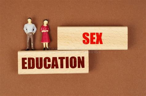 On Wooden Blocks With The Inscription Sex Education There Are Miniature Figures Of People