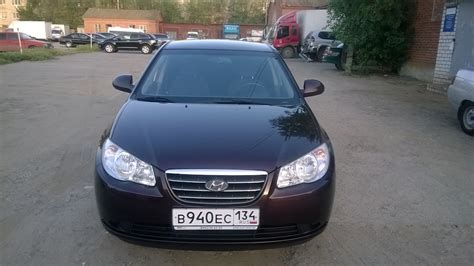 Hyundai Elantra (4G) 1.6 бензиновый 2009 | вишневый металлик 1.6 на DRIVE2