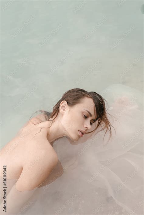 Portrait Of A Beautiful Naked Girl In The Water Stock Photo Adobe Stock