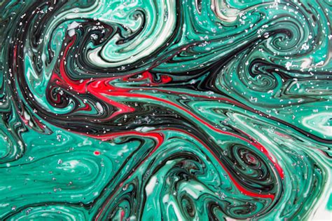 녹색 빨간색과 검은 대리석의 추상 아름 다운 패턴입니다 아크릴 물감으로 물에 페인트 Ebru의 동쪽 스타일은 소용돌이 세련 된 색상의 믹스 진짜 럭셔리 0명에 대한 스톡