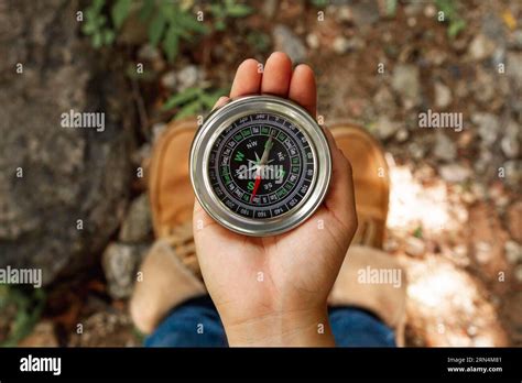 Top View Female Using Compass Directions Stock Photo Alamy
