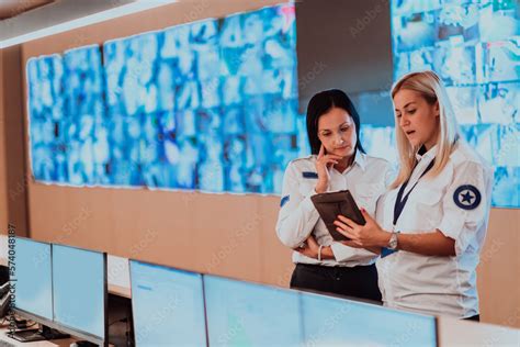 Group Portrait Of Female Security Operator While Working In A Data System Control Room Offices