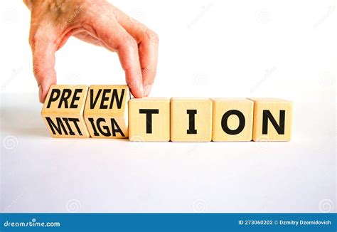 Prevention Or Mitigation Symbol Businessman Turns Cubes And Changes The Concept Word Mitigation