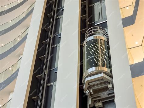 Glass Capsule Elevator Lift At Luxury Hotel Or Buildingmodern Glass