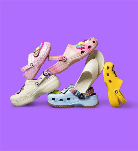 Stacked Crocs With Purple Background
