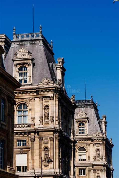 Hotel De Ville In Paris Showing Its Elegant Facade And Mansard Roof
