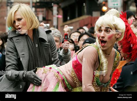 Actress Charlize Theron L Gives A Spanking To Harvard University