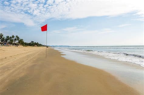 Premium Photo Red Flag On Beach On Sea Or Ocean As A Symbol Of Danger The Sea State Is