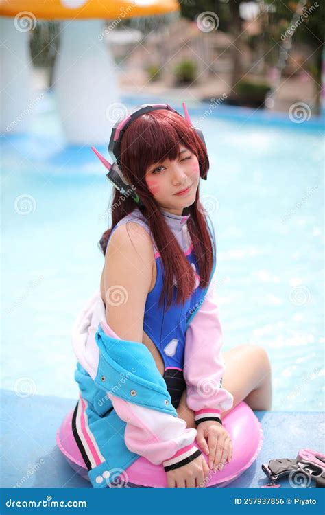 Portrait Of Japan Anime Cosplay Girl With Swim Suit At Swimming Pool