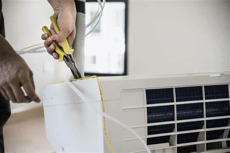 Man Is Installing Air Conditioner In Housing Unit During Hot Season In Thailand 9297884 Stock