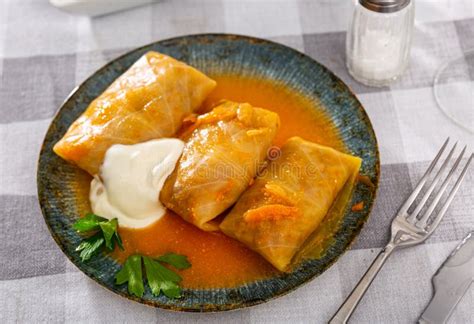 Cabbage Rolls In Cabbage Leaves With Sour Cream Dish Of European