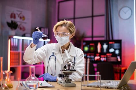 Premium Photo Medical Research Laboratory Portrait Of A Attractive Female Scientist Using