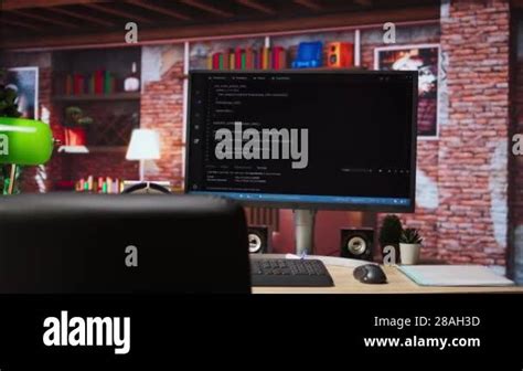 Code Typed Into Pc Entering Commands And Running Script Panning Shot Of Monitor On Desk