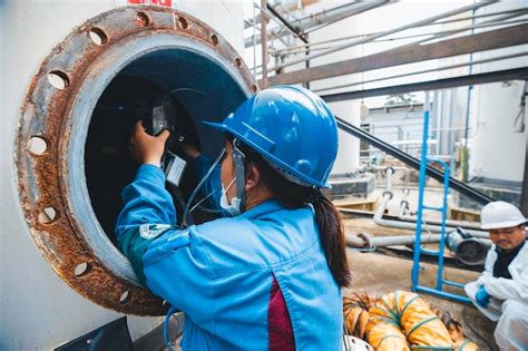 Premium Photo Worker Female Hand Holding Gas Detector Inspection Safety Gas Testing At Front