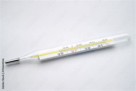 Glass Mercury Thermometer For Measuring The Temperature Of The Human Body Stock Photo Adobe Stock