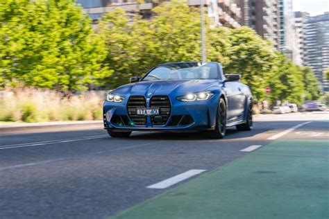 2022 Bmw M4 Csl Vs 2022 Bmw M4 Competition M Xdrive Comparison Carexpert