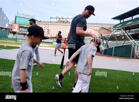 Baltimore Orioles Catcher James Mccann Center Walks With His Twin