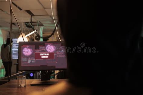Male Thief Reading Computer System Hacking Error Message Stock Image