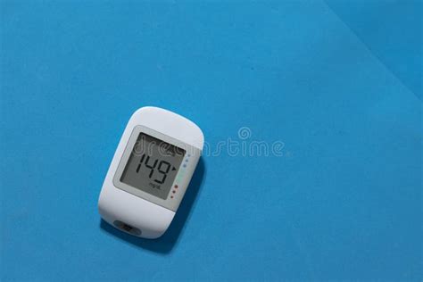Glucometer Showing A Bad Result In The Display Glucometer On Pure Blue