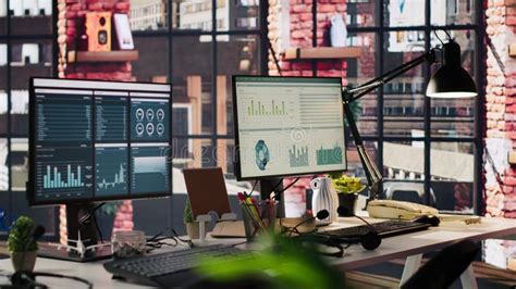 Computer Monitors On Office Desk Showing Data Analytics Dashboards Stock Video Video Of