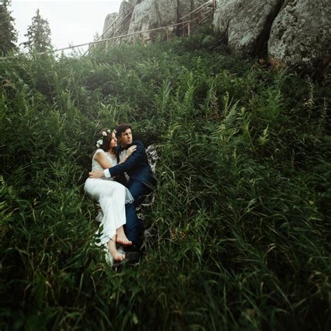 Premium Photo Luxury Happy Bride And Stylish Groom Lying On Grass