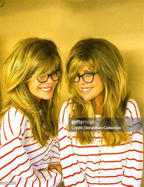 Shane Barbi And Sia Barbi Of The Barbi Twins Pose For A Portrait With