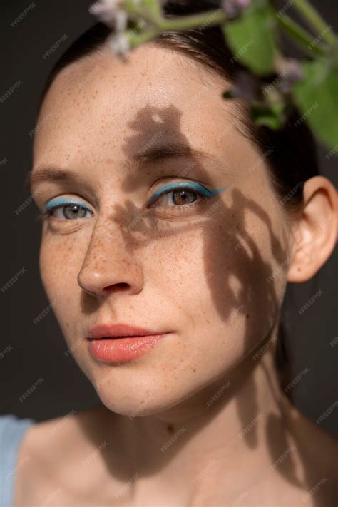 Free Photo Front View Woman Posing With Flower