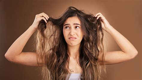 Problem Hair Loss And Sad Woman In Studio For Beauty Messy And Damage
