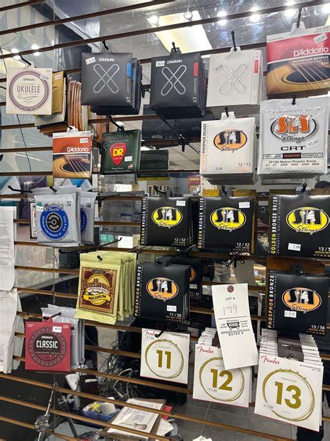 assorted inventory of strings proxibid