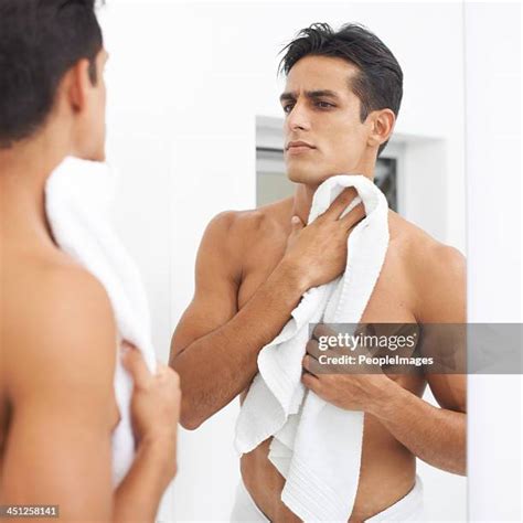 Man In Towel Shower Photos And Premium High Res Pictures Getty Images