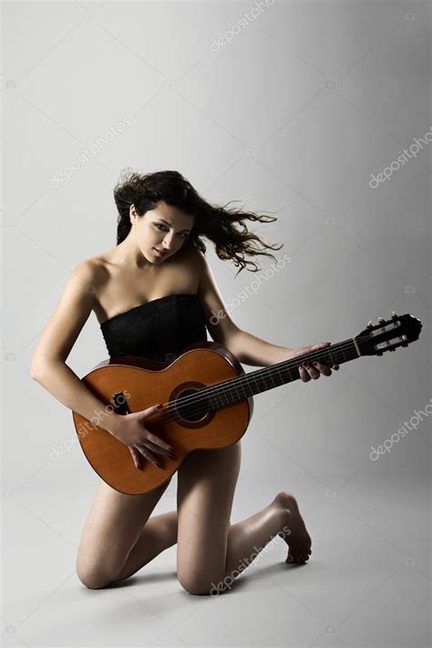 Sexy Woman With A Guitar Stock Photo Ikostudio