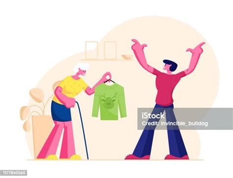 크리스마스 휴일에 성인 손자에 순록 머리 프린트와 전통적인 니트 스웨터를 제시 하는 산책 지팡이와 선임 여자 할머니 크리스마스에