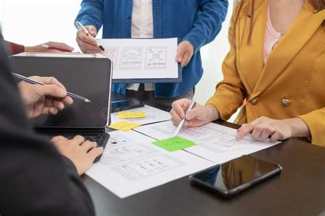 Team Of Ui Ux Web Designer Are Working Together To Develop Mobile