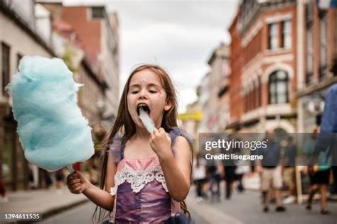 Girl Eating Candy Floss Photos And Premium High Res Pictures Getty Images